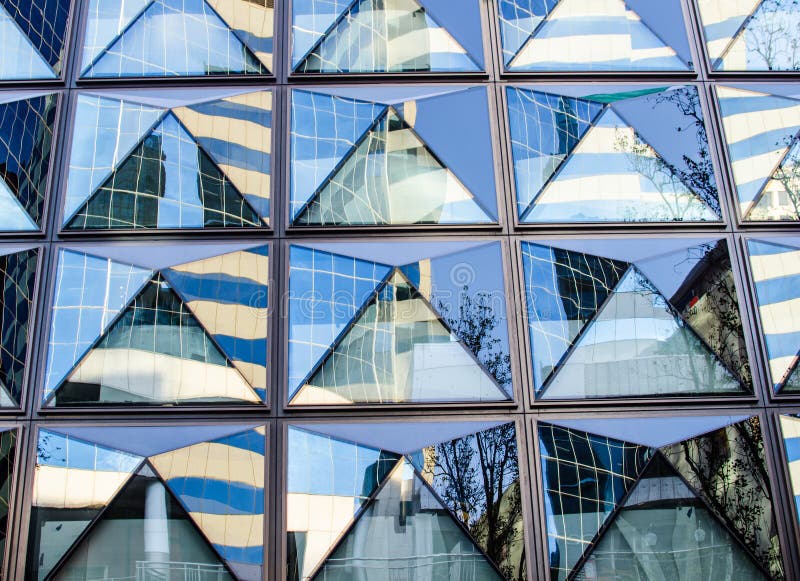 Abstract Pattern Glass Window Building in Triangle. Stock Photo - Image ...