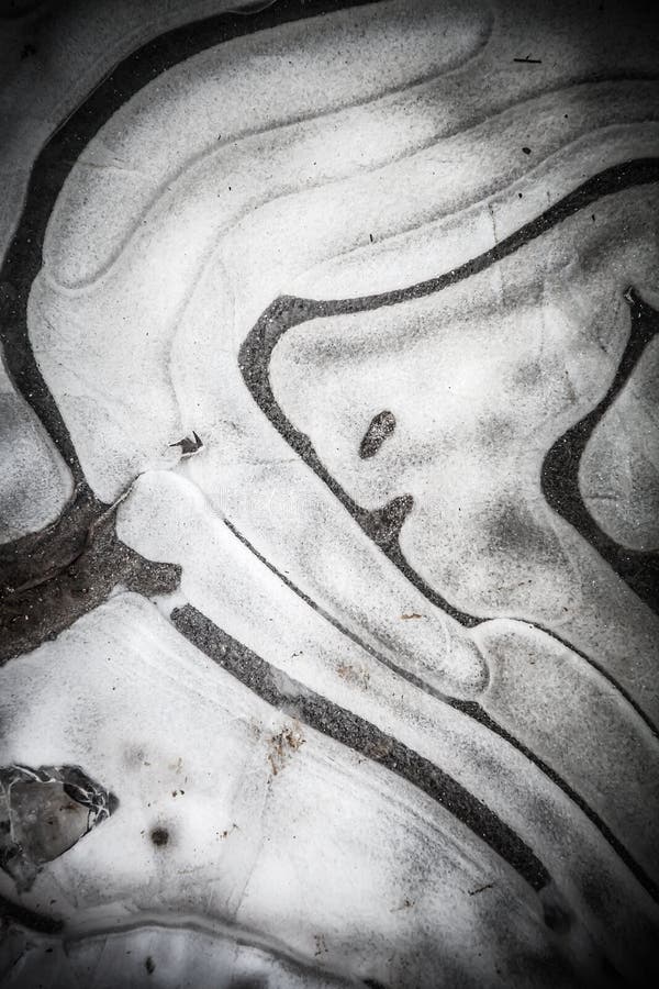 Abstract Pattern of Ice on the Over of Puddle. Toned Stock Image ...