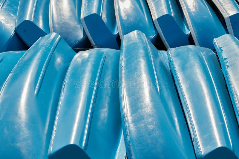 Abstract Photo of Stacked Blue Boats Upside Down Stock Image - Image of ...