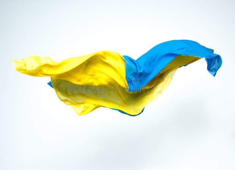 Abstract Pieces of Blue and Yellow Fabric Flying Stock Image - Image of ...