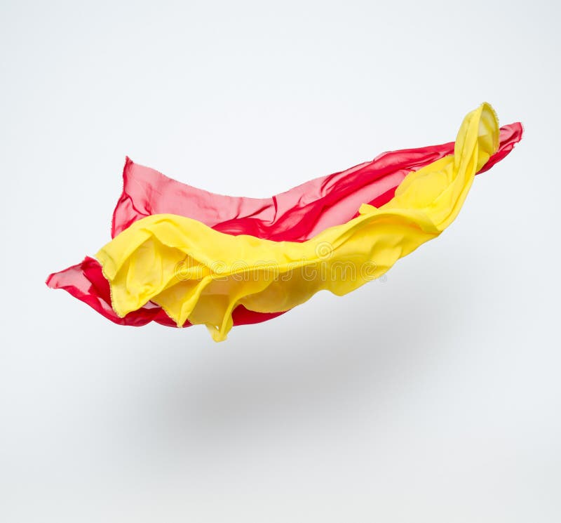 Abstract Pieces of Red and Yellow Fabric Flying Stock Image - Image of ...