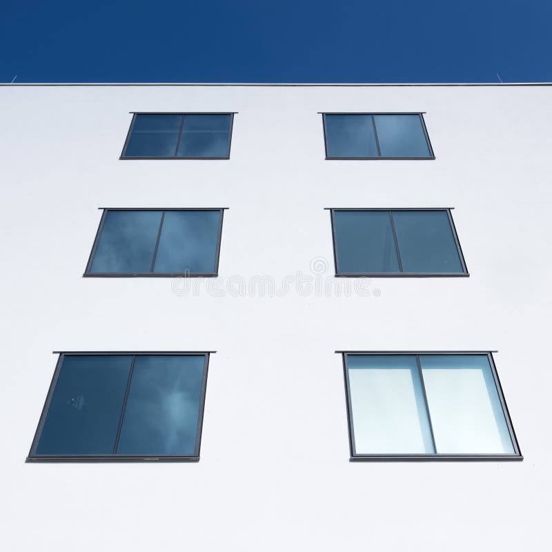 Abstract Rectangular Forms of Windows in White Wall Reflect Blue Sky ...