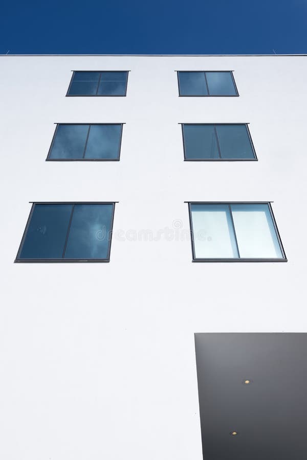 Abstract Rectangular Forms of Windows in White Wall Reflect Blue Sky ...