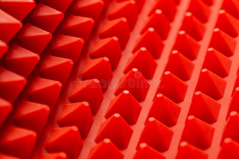 Abstract Red Silicone Pyramids Mat Close-up Background Stock Photo ...