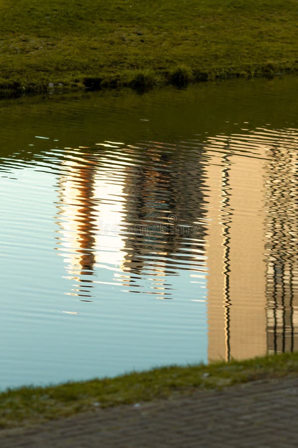 Abstract Reflection in the Water. Sunny Day. Distorted View with ...