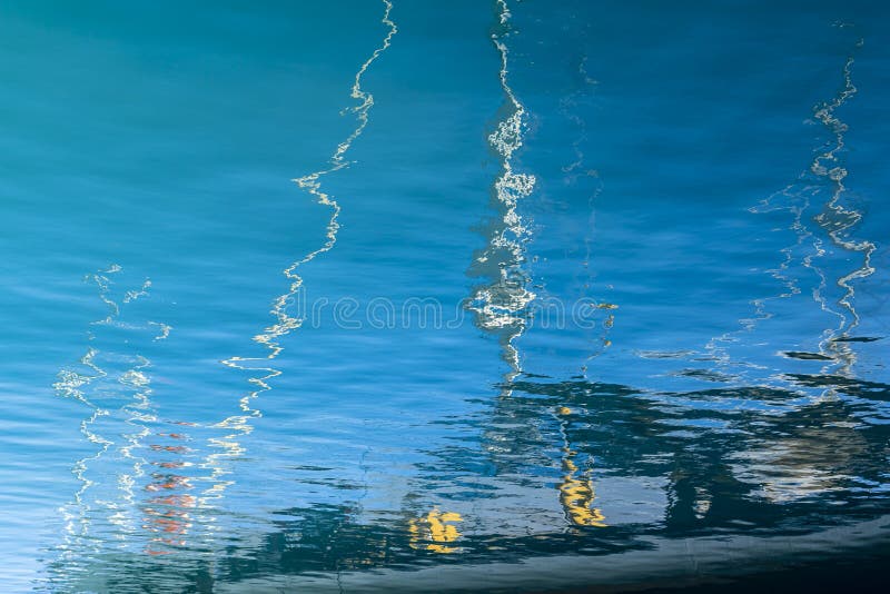 Abstract Reflections in Blue Water Stock Photo - Image of reflections ...