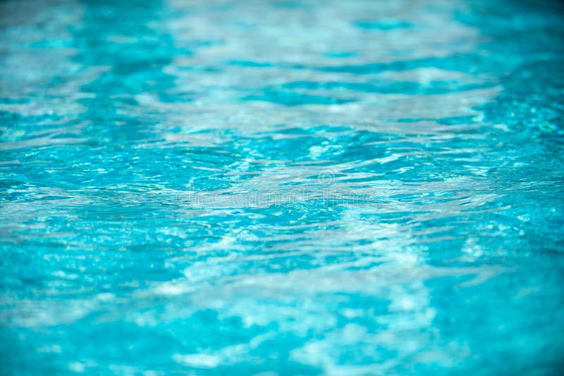 Pool with Blue Water Ladder for Descent and Ascent into the Water. the ...