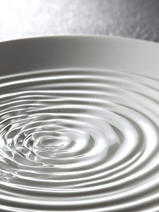 Abstract Ripples in Water Creating a Hypnotic Circular Pattern with ...