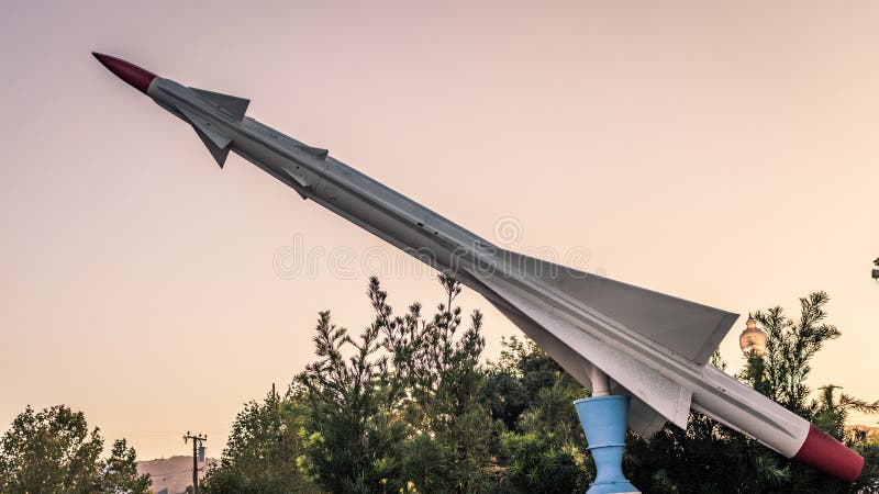 An Artistic Sculpture in the Shape of a Rocket or Missile with a Red ...