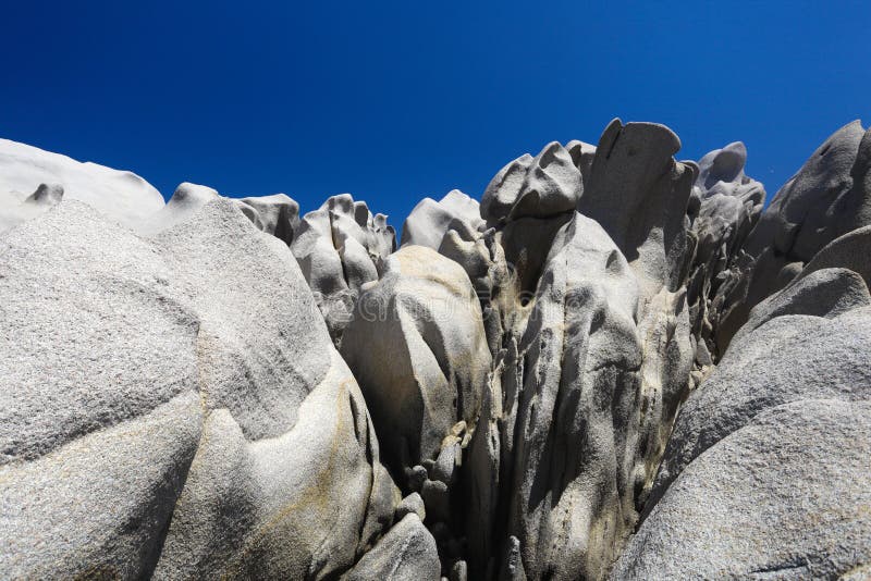 Abstract Rocks and Blue Sky Stock Image - Image of brick, granite: 34370273