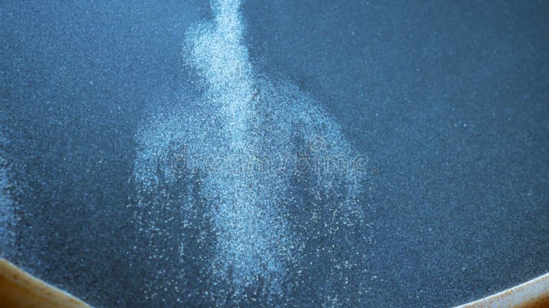 Abstract Sand Particles Falling in Slow Motion Under Blue Light Stock ...