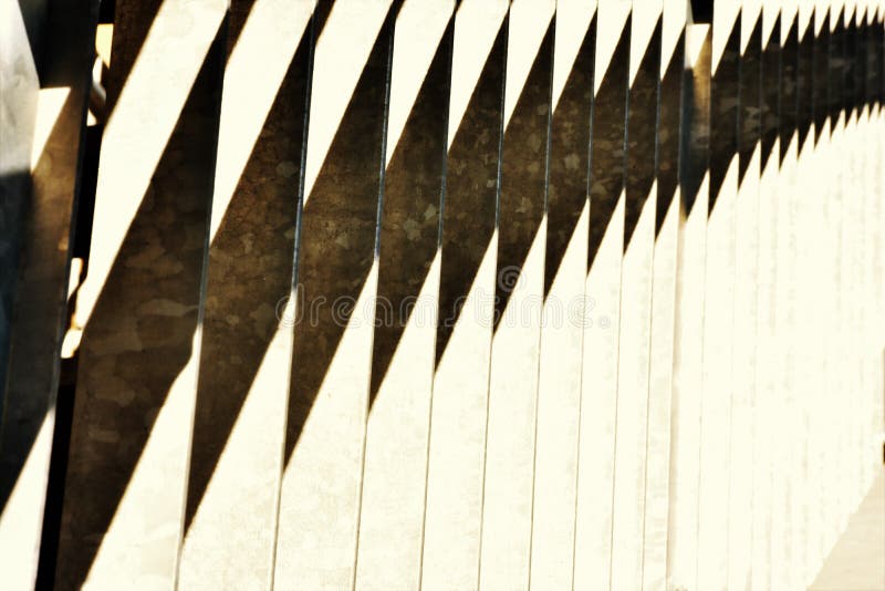 Shadow on Metal Rail Outdoors Stock Image - Image of shape, surface ...
