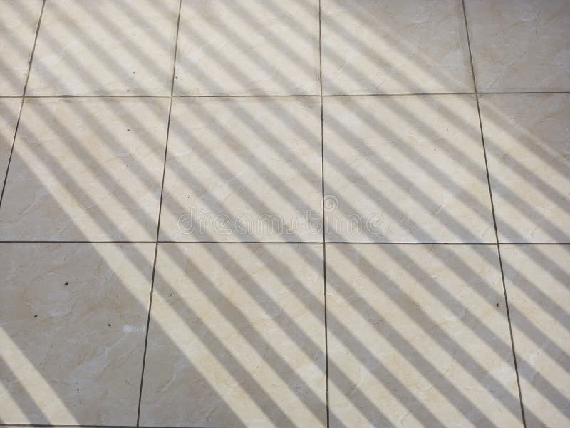Abstract Shadow Pattern on Modern Floor Tiles Stock Image - Image of ...