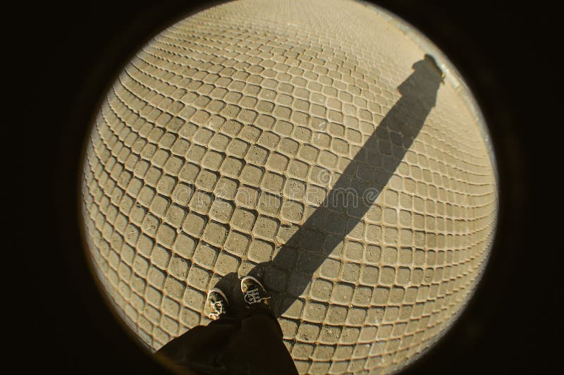 Abstract Shadow of a Person on Textured Cobblestone Surface with ...