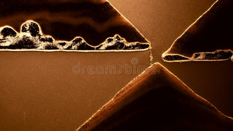 Abstract Shot of Sand Particles Falling Down, Creating Patterns. Slow ...