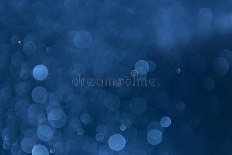 Abstract Sparkle Bokeh Light Effect with Navy Blue Background Stock ...