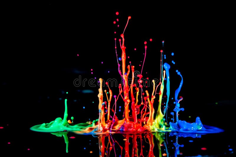 Abstract Splash of Color Ink on Black Background Stock Photo - Image of ...