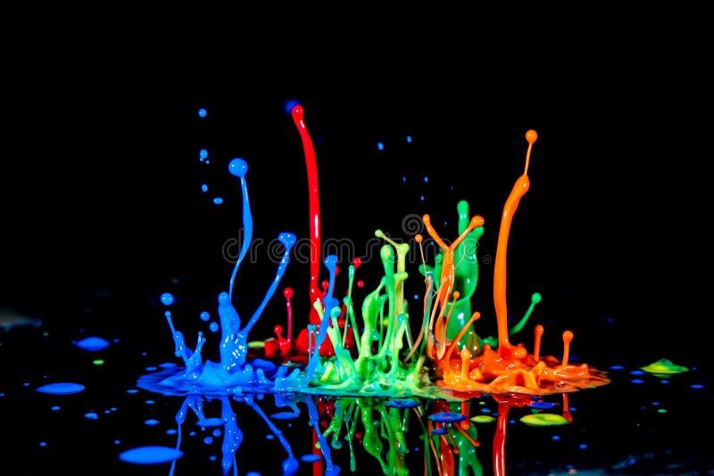 Abstract Splash of Color Ink on Black Background Stock Photo - Image of ...