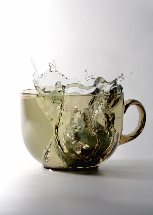 Abstract splash in cup stock photo. Image of bubbles - 218915256