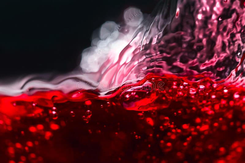 Abstract Splashes of Red Wine on a Black Background Stock Photo - Image ...