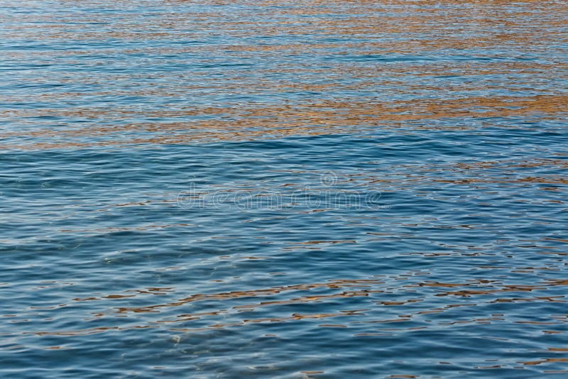 Sunset ripples on sea stock image. Image of colorful - 12158765