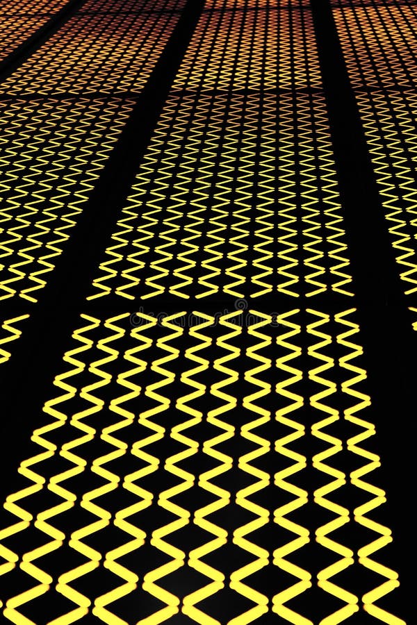 Abstract Texture of Luminous Yellow Lamps on a Black Background Stock ...