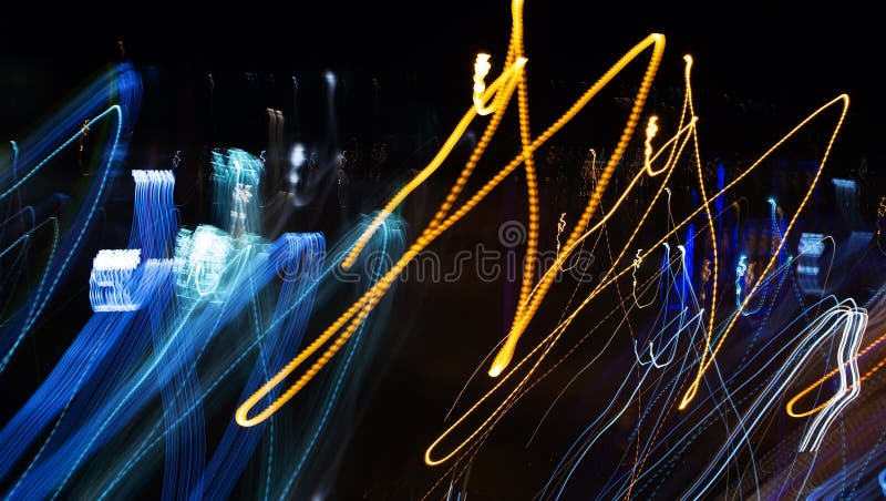 Abstract Urban Background with Blue and Yellow Light Tracks. New ...