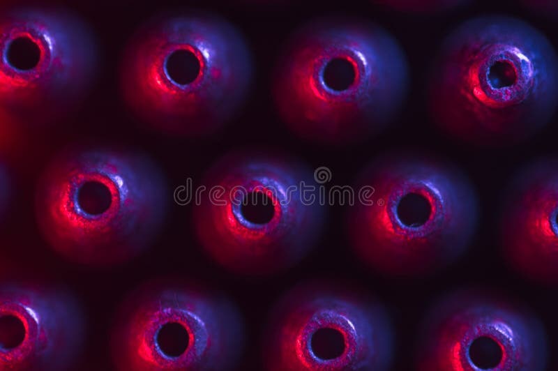 Hollow Point Bullets in an Abstract of Red and Blue Stock Image - Image ...