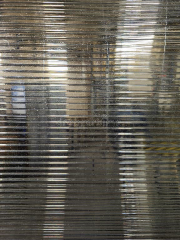 Abstract View through Textured Glass Panels in an Indoor Setting Stock ...