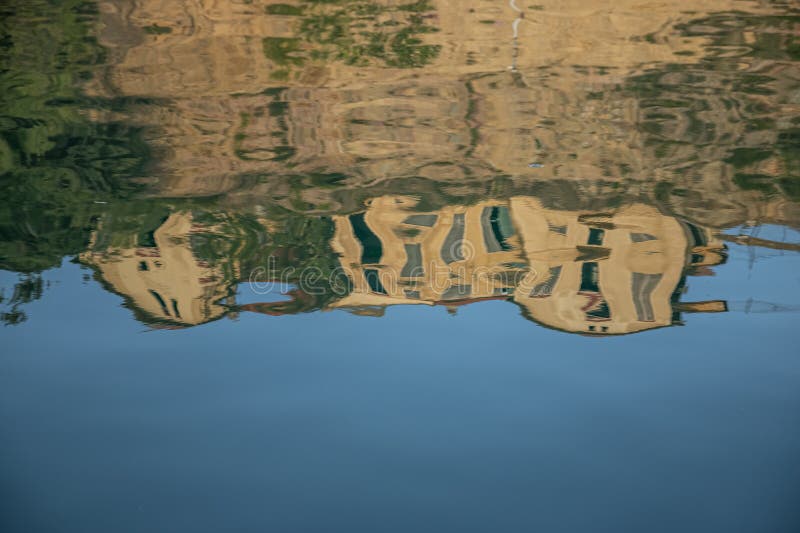 Abstract Water Reflection of Building on Water Surface in the Pond at ...