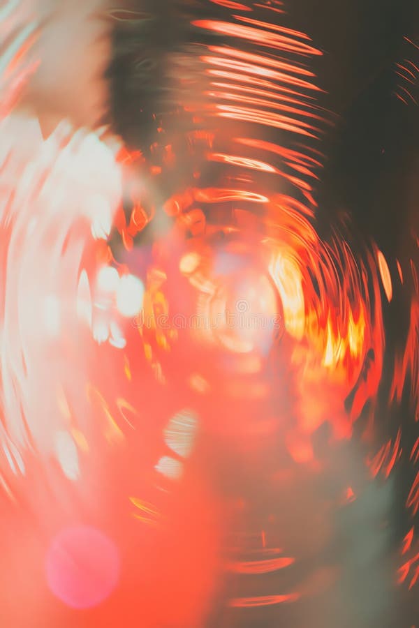 Abstract Water Ripple Effect with Red and Orange Light Reflections ...