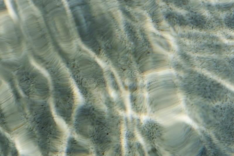 Abstract Water Ripple Pattern in a Swimming Pool with a Sun Reflection ...