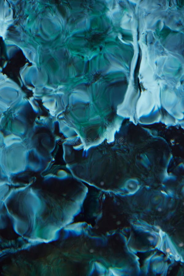 An Abstract Water Texture. Turquoise Transparent Wavy Surface of a Pond ...