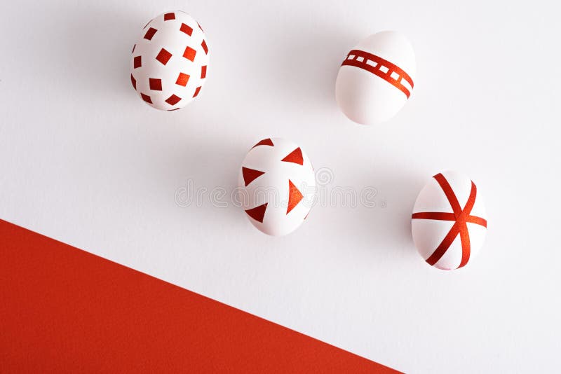 Abstract White Easter Eggs with Red Geometric Patterns on Red and White ...