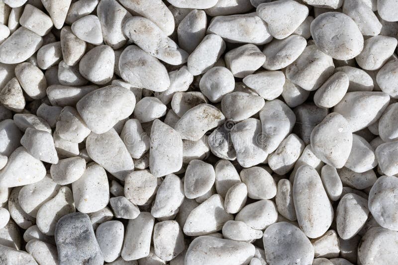 A Bunch of White Rocks are Piled Together on the Ground Stock Image ...