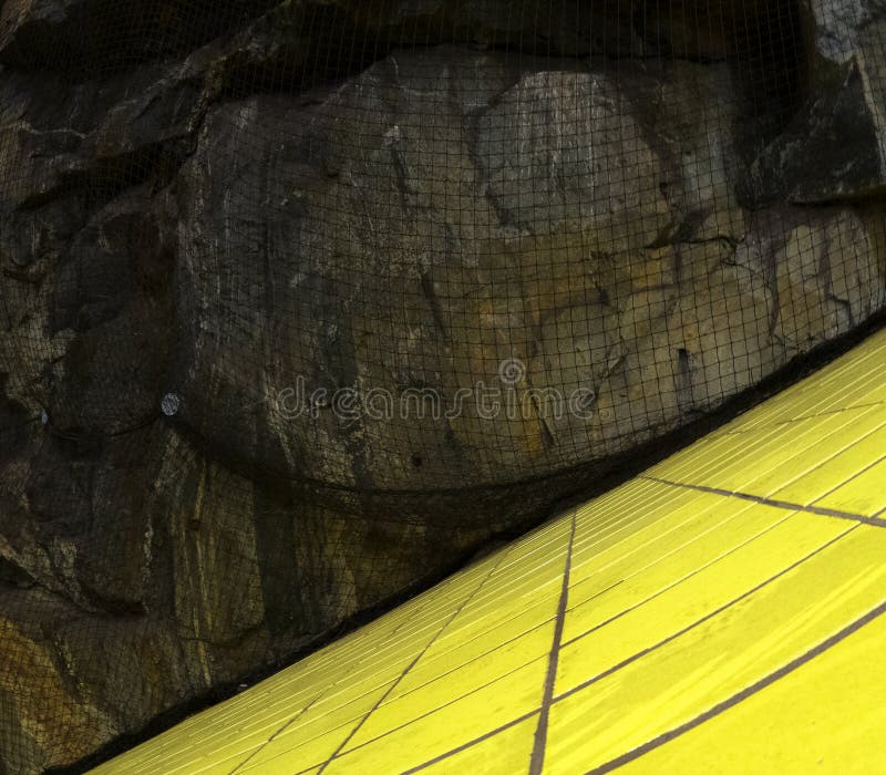 Abstract of Yellow Tile and a Rock Wall Stock Photo - Image of ...