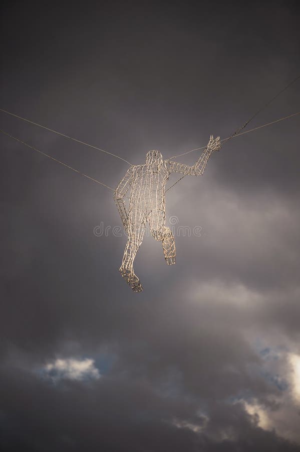 Abstraction of a Electricity Man from a Wire in Front of a Stormy ...