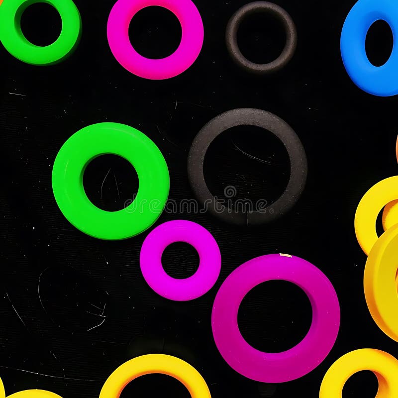 Abstraction, Multi-colored Rings of Different Sizes on a Black ...