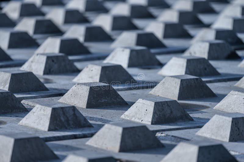 Abtract Pattern of Pegs on Top of Concrete Blocks.. Stock Image - Image ...