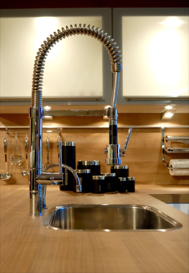 Abundance Tap and Kitchen Sink in Design Kitchen Stock Image - Image of ...