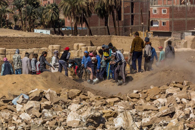 ABYDOS, EGYPT - FEB 19, 2019: Group of Workers at Excavations in Abydos ...
