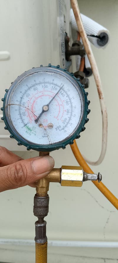 AC freon pressure stock image. Image of number, hand - 363790667