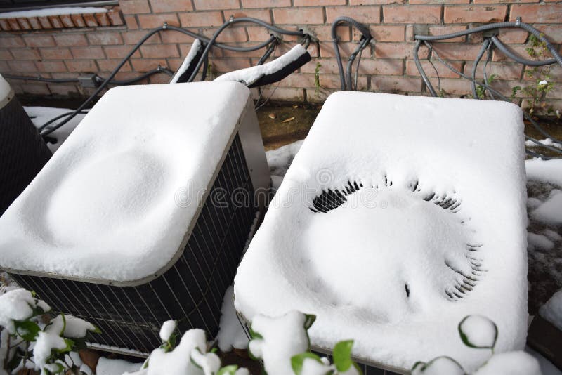 Central Air Conditioner Condenser Covered with Snow Stock Image - Image ...