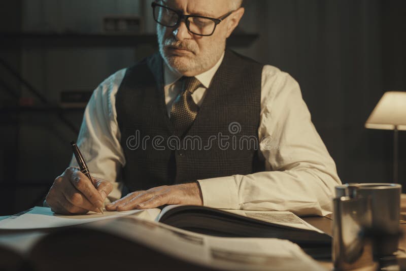 Academic Professor Writing Down Notes and Reading a Book Stock Image ...