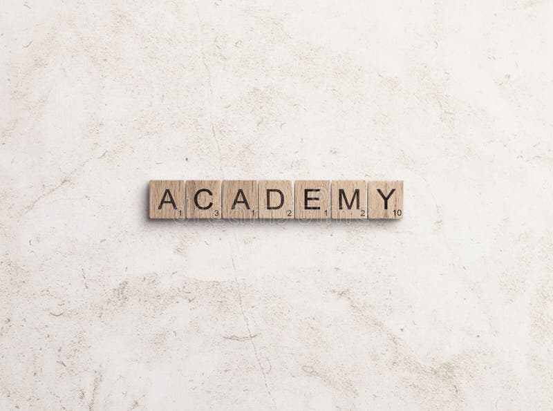 Academy Word Written on Wooden Cubes Background. Creative Text Concept ...