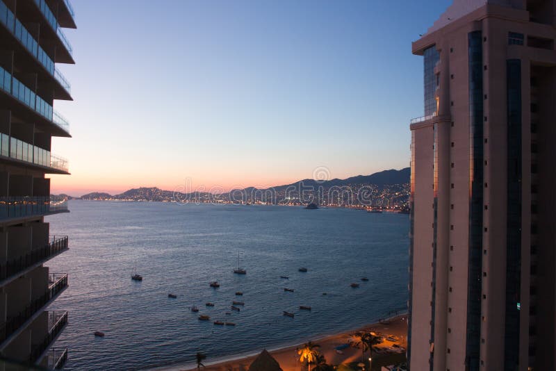 Acapulco bay sunset stock image. Image of hotel, mexican - 94333941