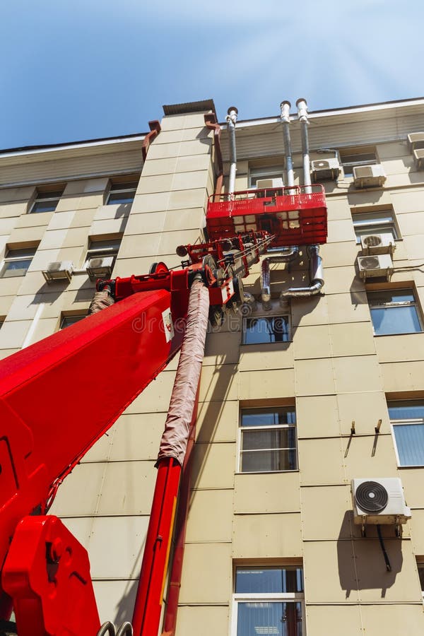 Access Platform Equipment Working High in the Sky at a Construction ...