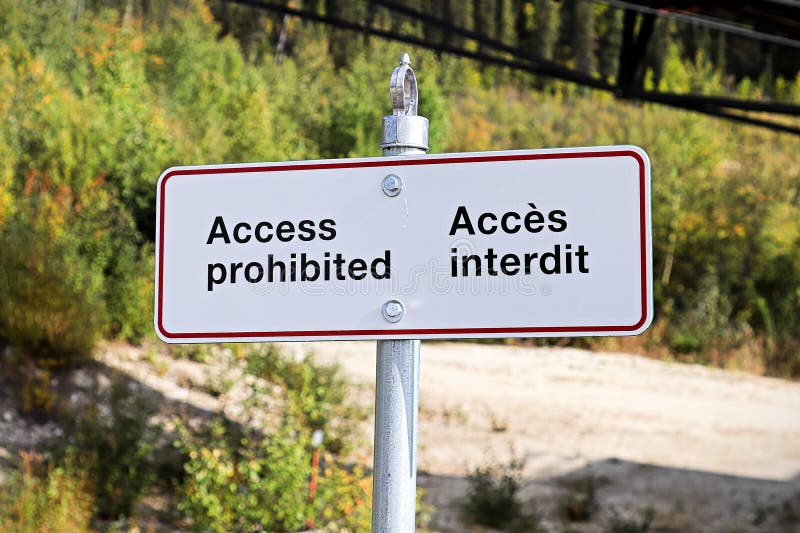 An Access Prohibited Sign in English and French Stock Image - Image of ...