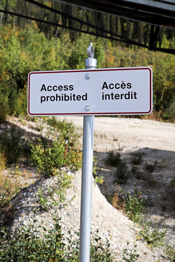 An Access Prohibited Sign in English and French Stock Image - Image of ...