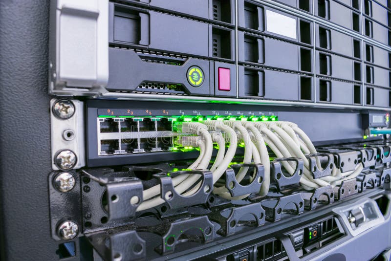 A Row of Servers in a Server Room with Red and Blue Lights Stock Photo ...